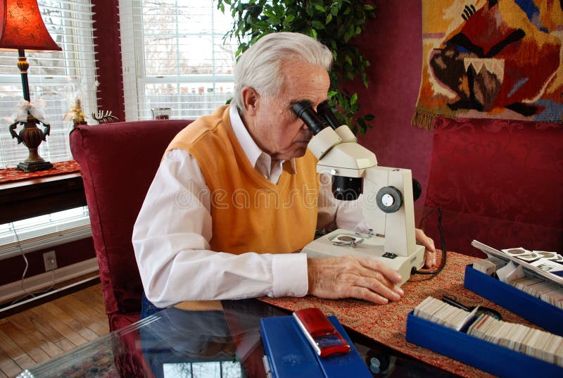 Man Viewing Old Coin Under a Microscope Stock Photo - Image of cash ...