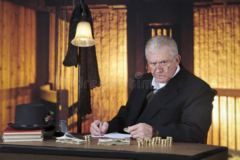 Coin Counting Miser stock image. Image of light, ledger - 45232277