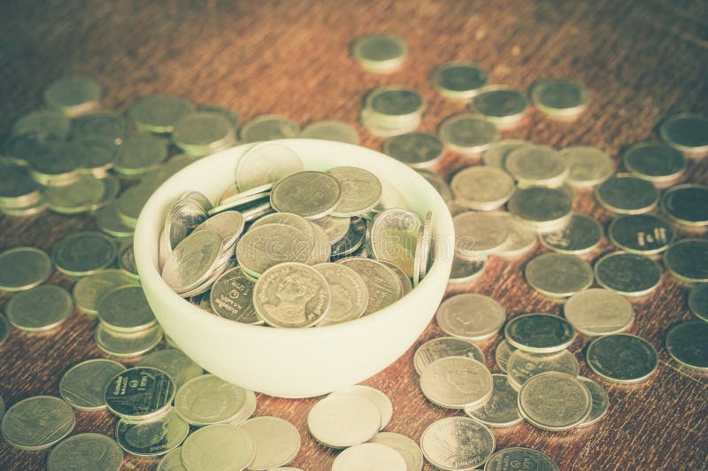 Coin in the cup stock photo. Image of white, recovery - 60997458