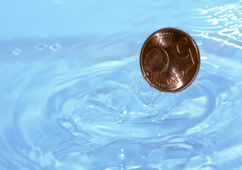 Coin drops in water stock image. Image of bath, light, moment - 832137