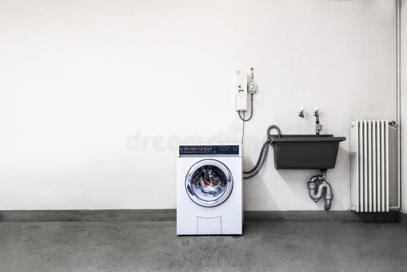 Coin machine laundry room stock photo. Image of appliance - 117857660