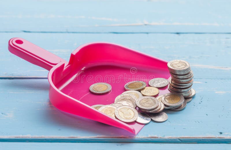 Coin or money in dust pan stock image. Image of dust - 90543855