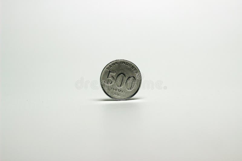 Coin Standing in the Front of White Background Stock Image - Image of ...