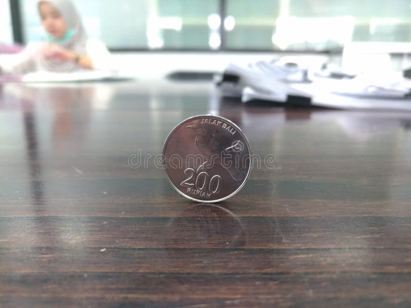 Coin on a table stock image. Image of indonesia, coin - 84818681