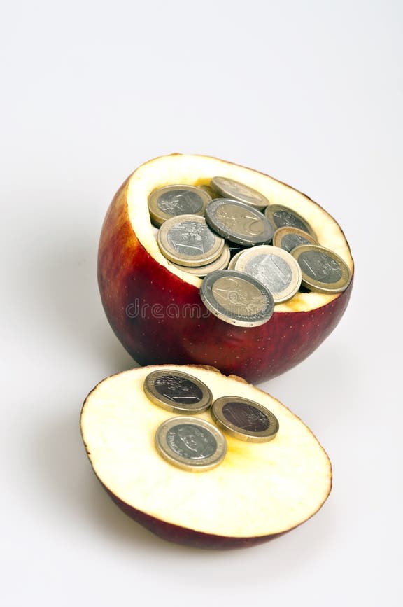 Coins on apple stock photo. Image of concept, currency - 20112134