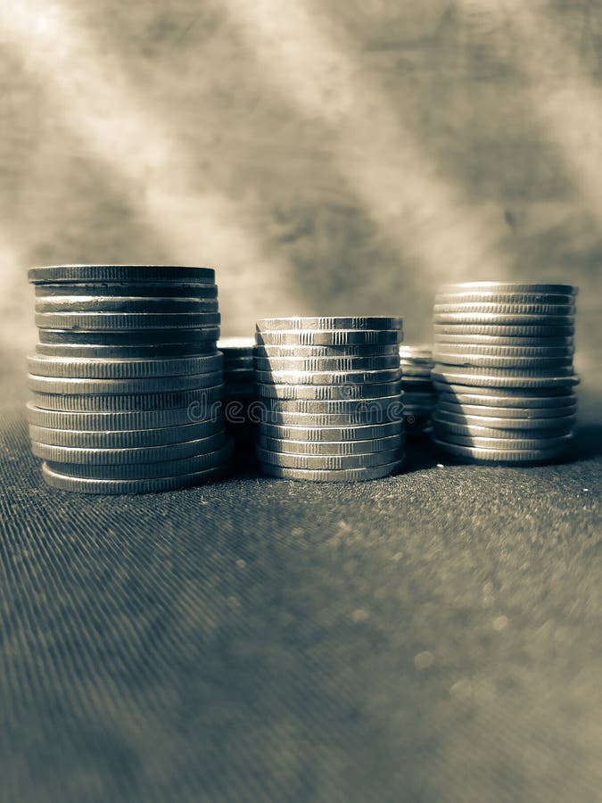 The Coins are Arranged Vertically Stock Image - Image of vertically ...
