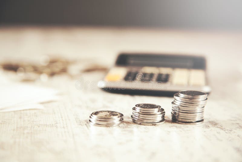 Coins with calculator stock photo. Image of payment - 196470064