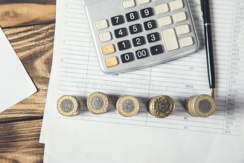 Coins and Calculator on Document Stock Photo - Image of graph, currency ...