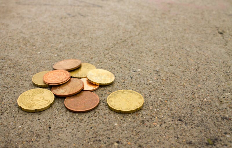 Coins on the cement floor stock photo. Image of fracture - 137762244
