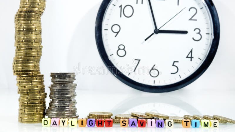 Coins with Clock on White Table. Summer Daylight Saving Time DST Stock ...