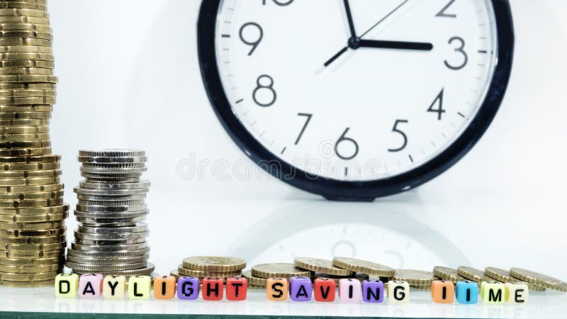 Coins with Clock on White Table. Summer Daylight Saving Time DST Stock ...