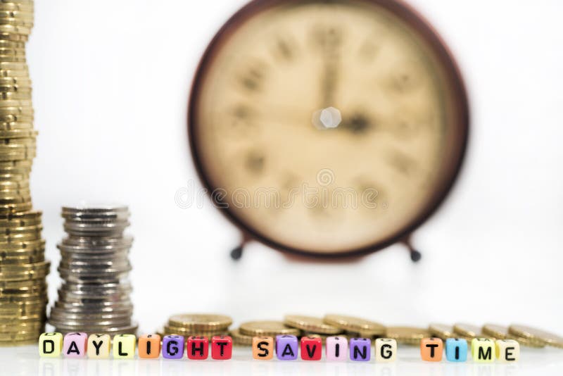 Coins with Clock on White Table. Summer Daylight Saving Time DST Stock ...