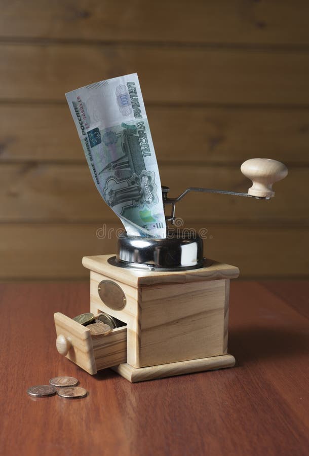 Coins in a cofee mill stock photo. Image of spend, consumer - 66494544