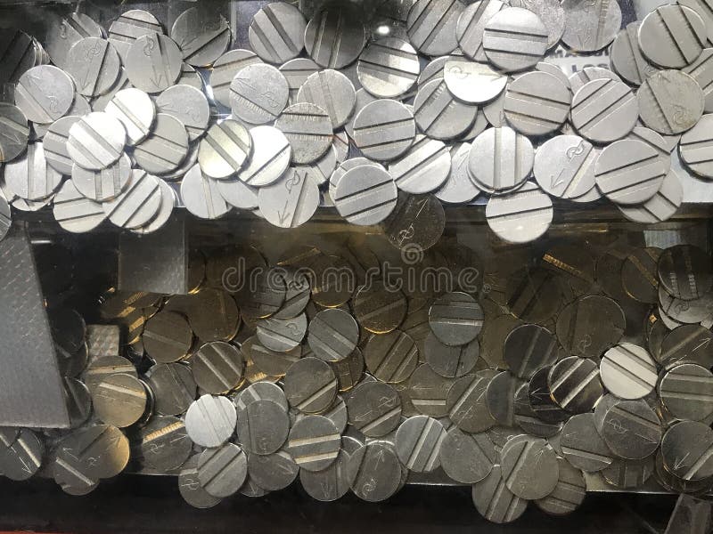 Coins from a Coin Cascade Machine. Stock Photo - Image of falling ...