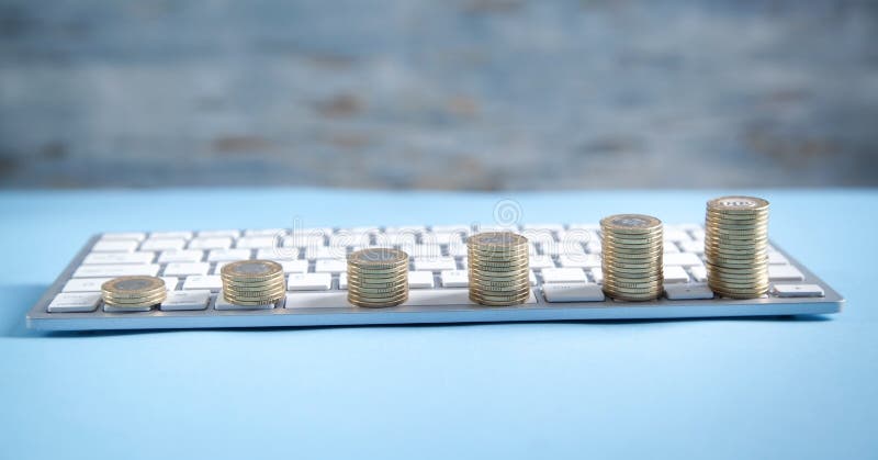 Coins on the Computer Keyboard Stock Photo - Image of stack, keyboard ...