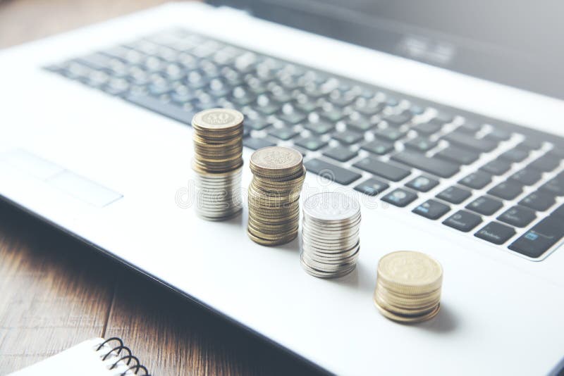 Coins on computer keyboard stock photo. Image of rich - 182028976
