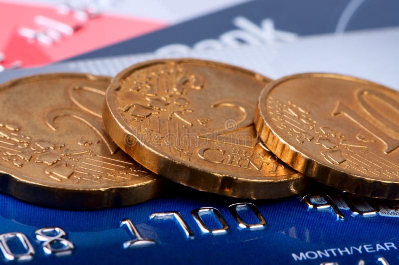 Coins and credit cards. stock photo. Image of development - 18948790