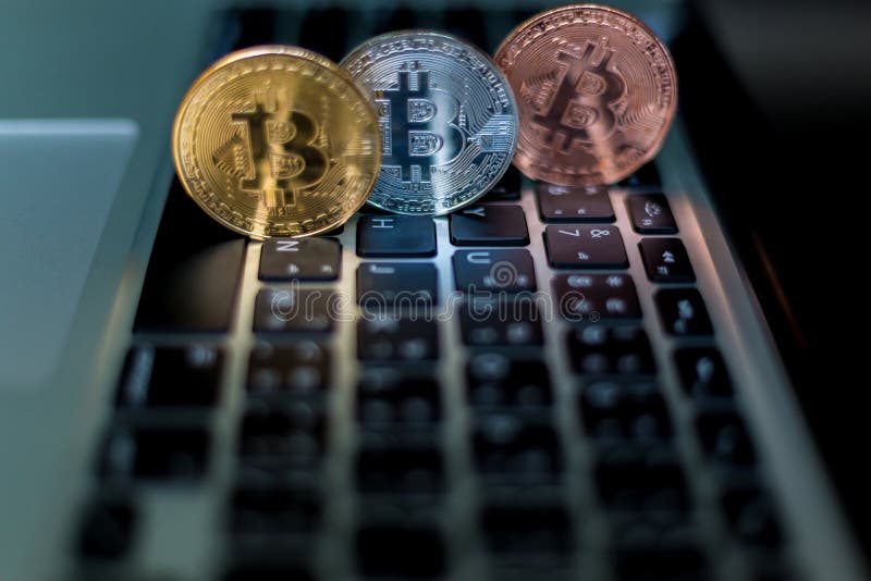 Coins of Cryptocurrency or Bitcoin Lying Over Laptop Keyboard, Stock ... Coins of Cryptocurrency or Bitcoin Lying Over Laptop Keyboard, Stock ...