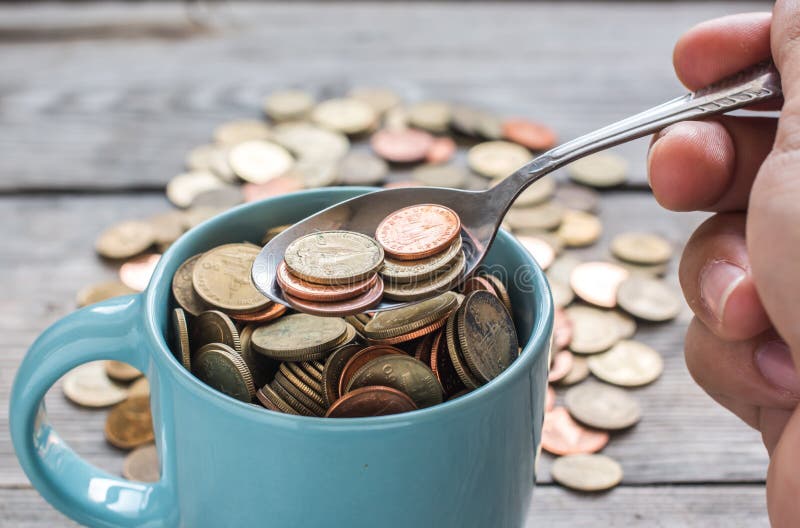Coins in cup stock image. Image of investment, bank, spoon - 45798643