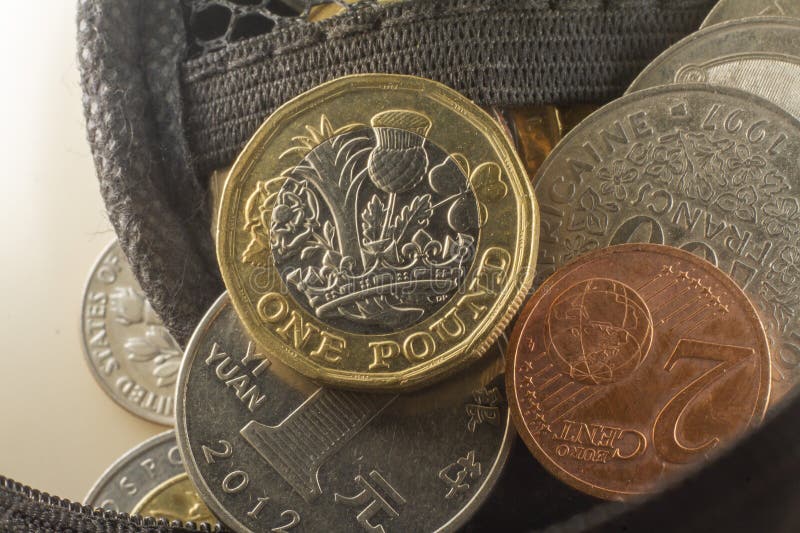 Coins, Currency All Over the World in Pocket Stock Image - Image of ...