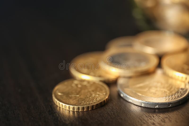 Coins on Dark Table, Closeup. Concept of Savings Stock Image - Image of ...