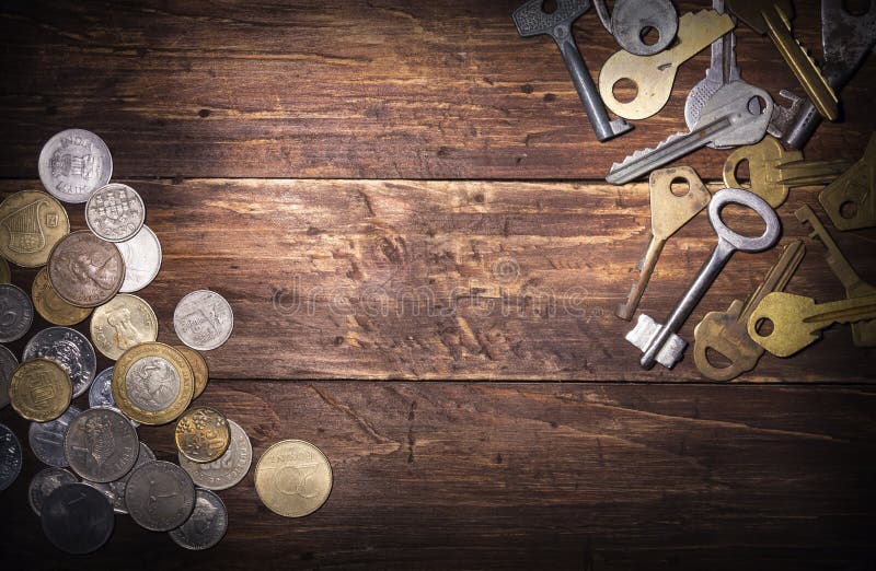 Coins of Different Countries and Several Old Keys on an Old Wooden ...
