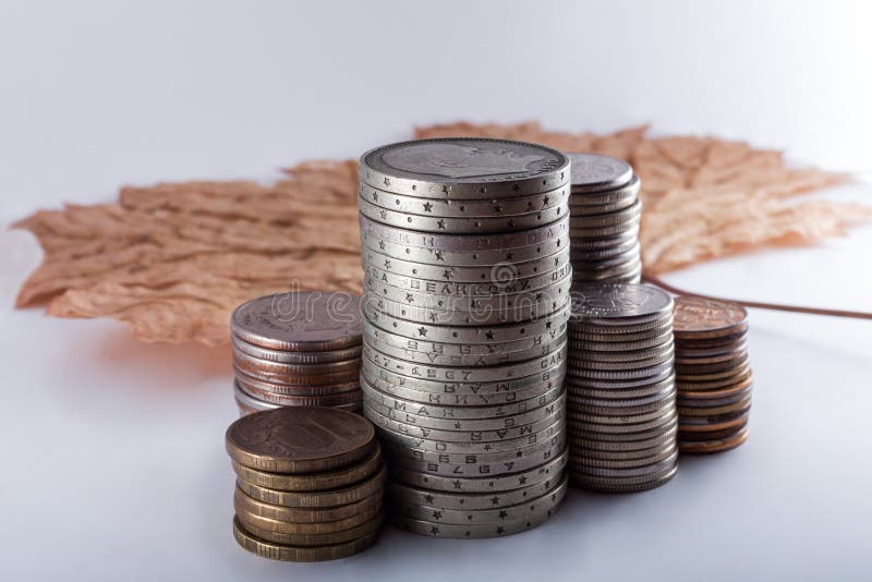 Coins and dry leaf stock image. Image of metal, wealth - 52392895