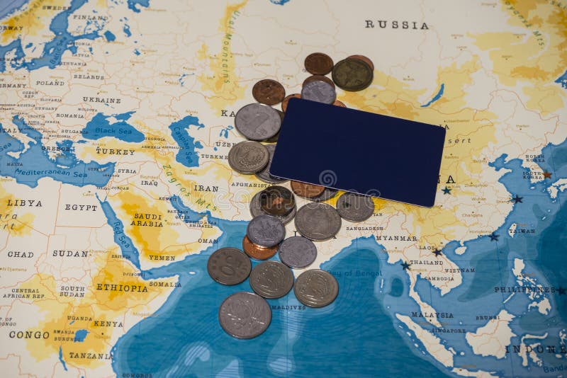 Coins of Each Country and Credit Card, Debit Card on the World Map ...