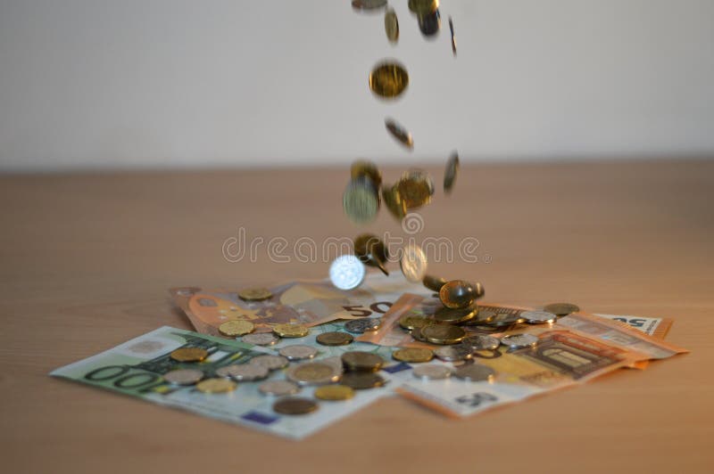 Coins falling on the cash stock photo. Image of euro - 113554632
