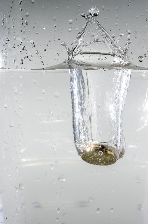 Coins Falling into the Water Stock Image - Image of falling, liquid ...