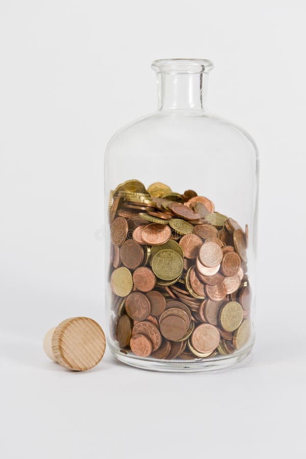 Coins in glas bottle stock photo. Image of bank, bottle - 22251156