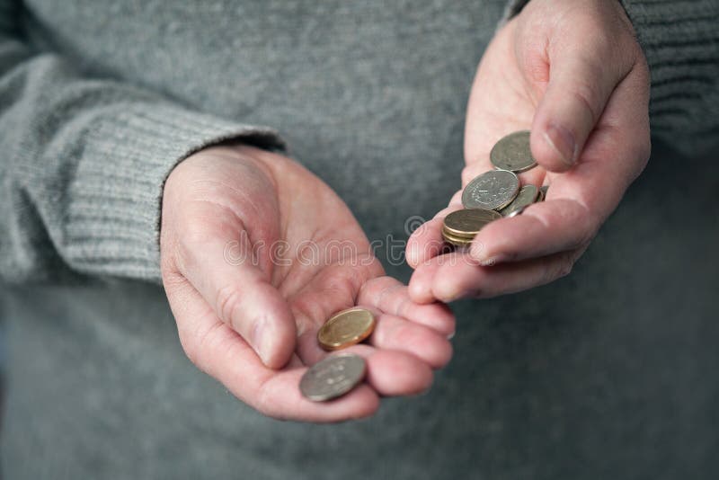 Coins in hands closeup stock image. Image of business - 69849337