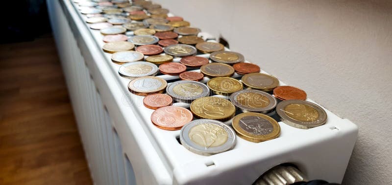 The Coins are on the Heating Radiator Stock Photo - Image of energy ...