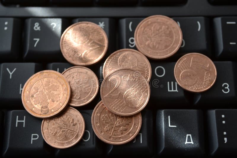 Coins on the keyboard stock photo. Image of allegory - 33736014
