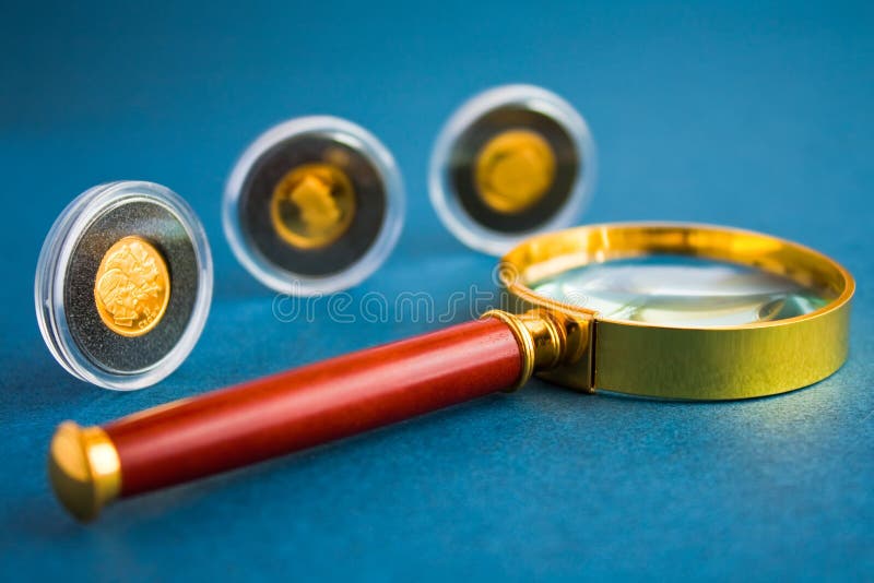 Coins and magnifier stock photo. Image of savings, value - 8958764