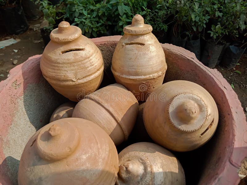 Coins and Notes Saver Pot of Mud Stock Image - Image of piggy, invest ...