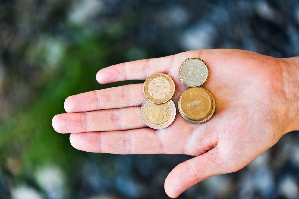 Coins in the palm of stock photo. Image of coins, natural - 26722244