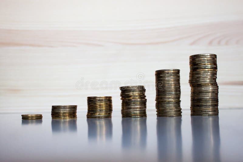 Rising coins stock image. Image of pile, growth, pound - 111666239