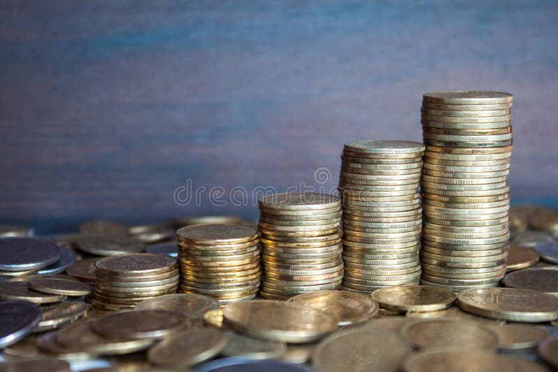Rising coins stock image. Image of improvement, graph - 111666311