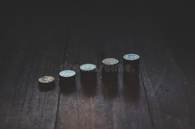 Coins placed in rows stock image. Image of investments - 145225231