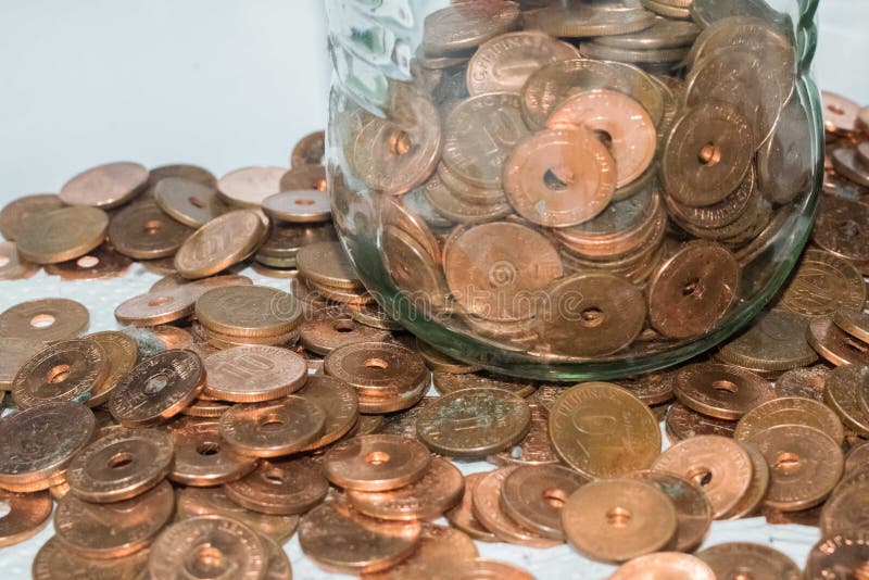 Coins inside the glass stock photo. Image of currency - 115504400