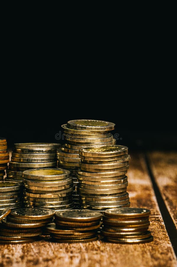 Coins Set Up in Rows of High and Low Elevation Patterns are Placed ...