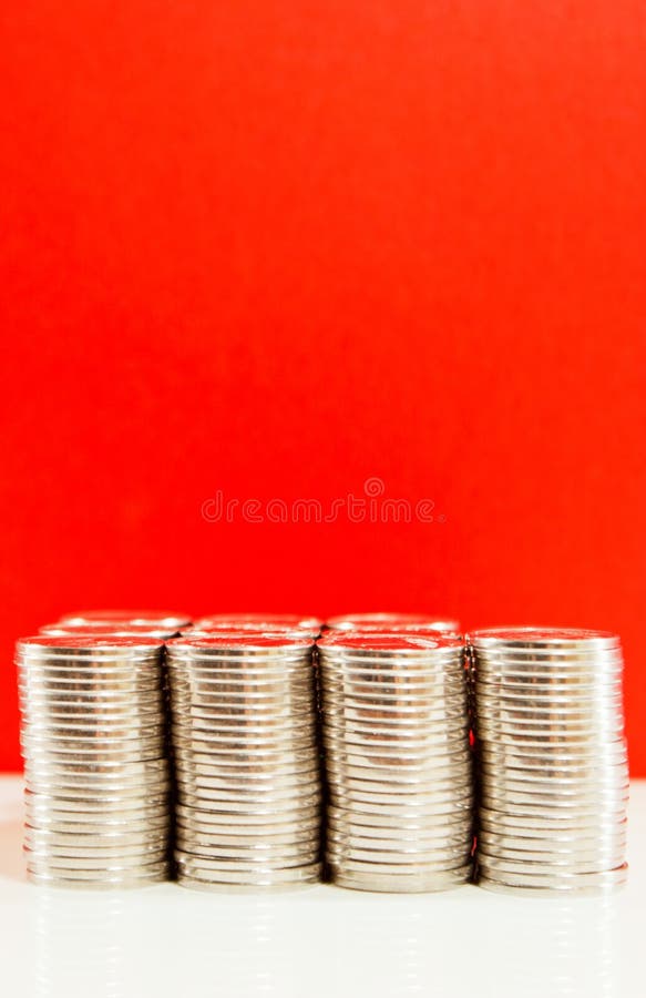 Coins stacked in bars stock image. Image of investment - 22741449