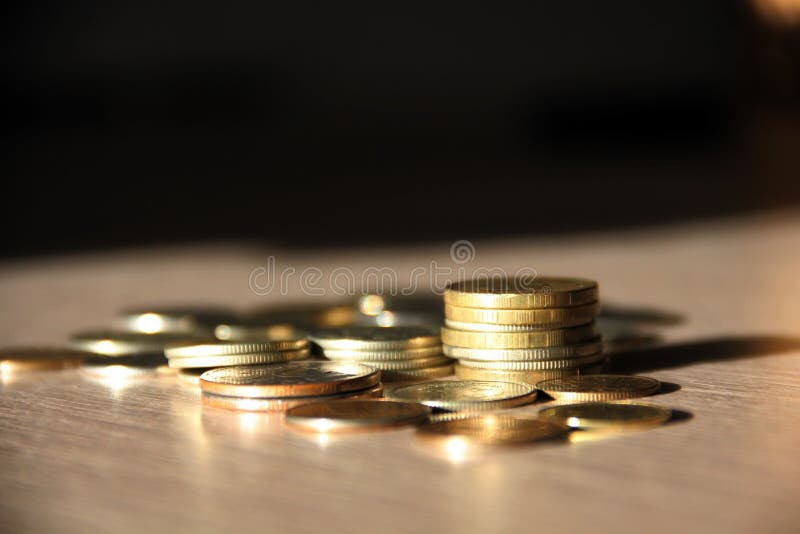 Coins on the table stock photo. Image of black, metal - 88521398