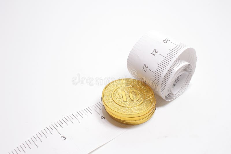 Coins and Tape Measure on the White Back Ground Stock Photo - Image of ...
