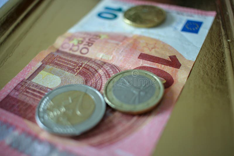 Coins and a Ten Euro Bank Note Stock Image - Image of budgeting ...