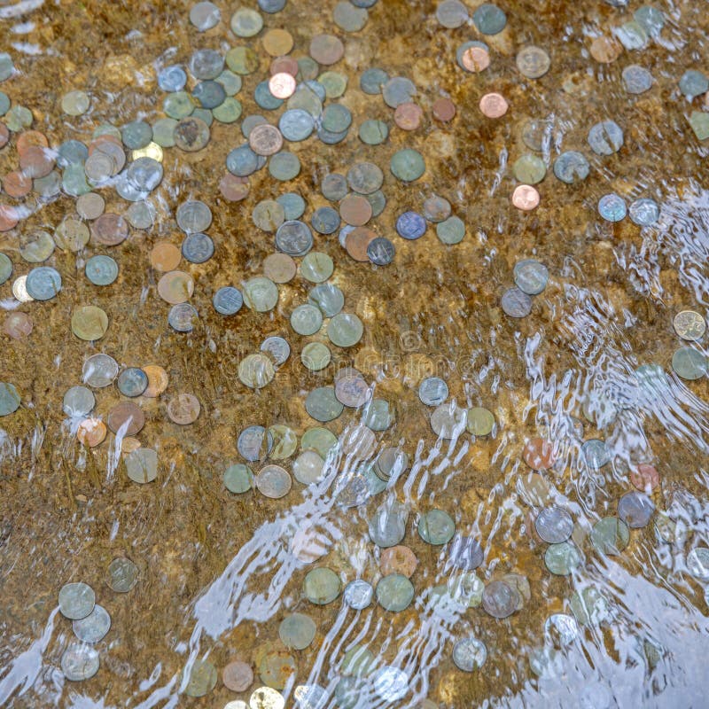 Coins Under Water stock photo. Image of water, view - 335996958