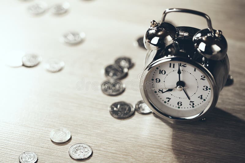 Coins with Vintage Clock on Desk Stock Photo - Image of vintage, money ...