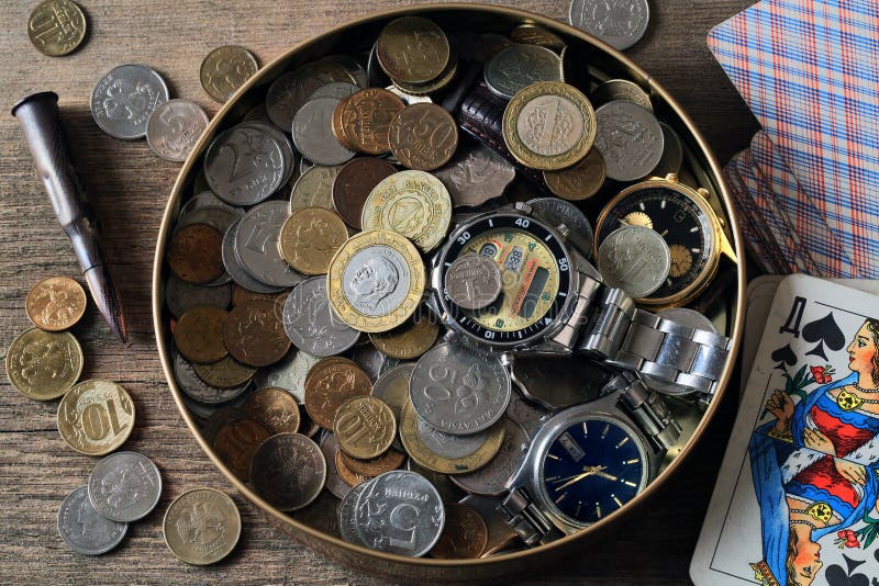 Coins, Watches, Playing Cards and a Bullet Shell Stock Image - Image of ...