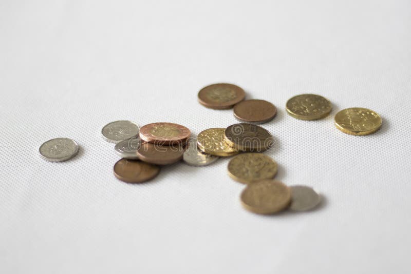 Coins on white background stock photo. Image of silver - 142320158